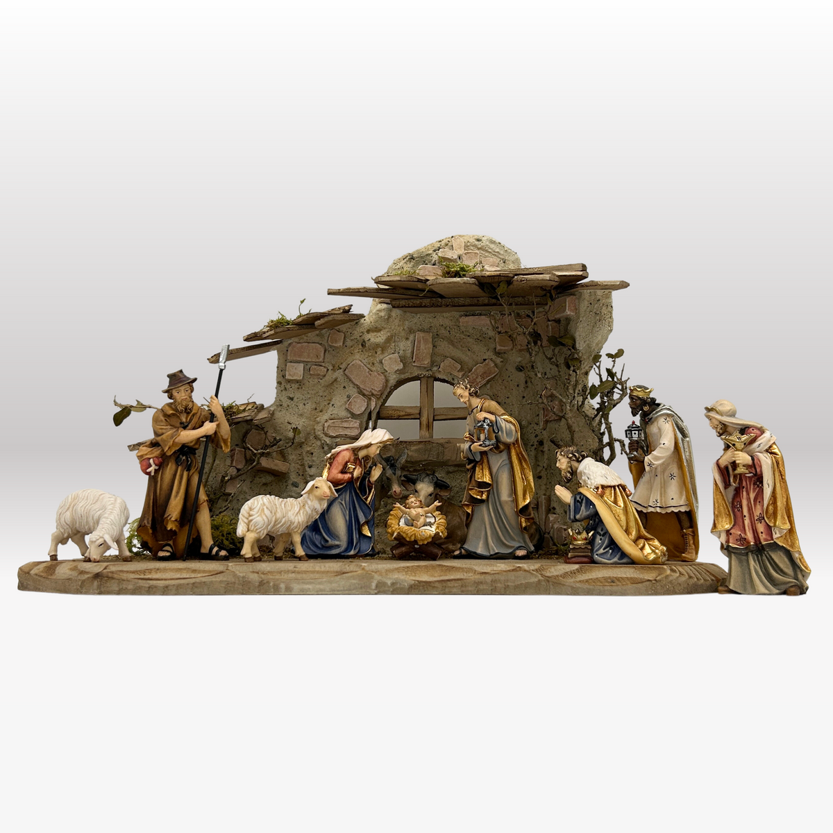 Nativity set with rustic stable (11 figures) - Kostner nativity