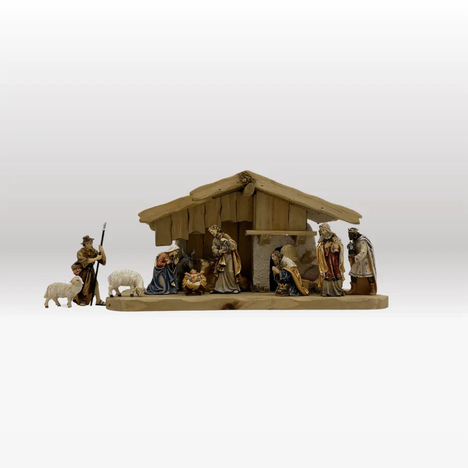 Nativity set with Tyrol stable (11 figures) - Kostner nativity